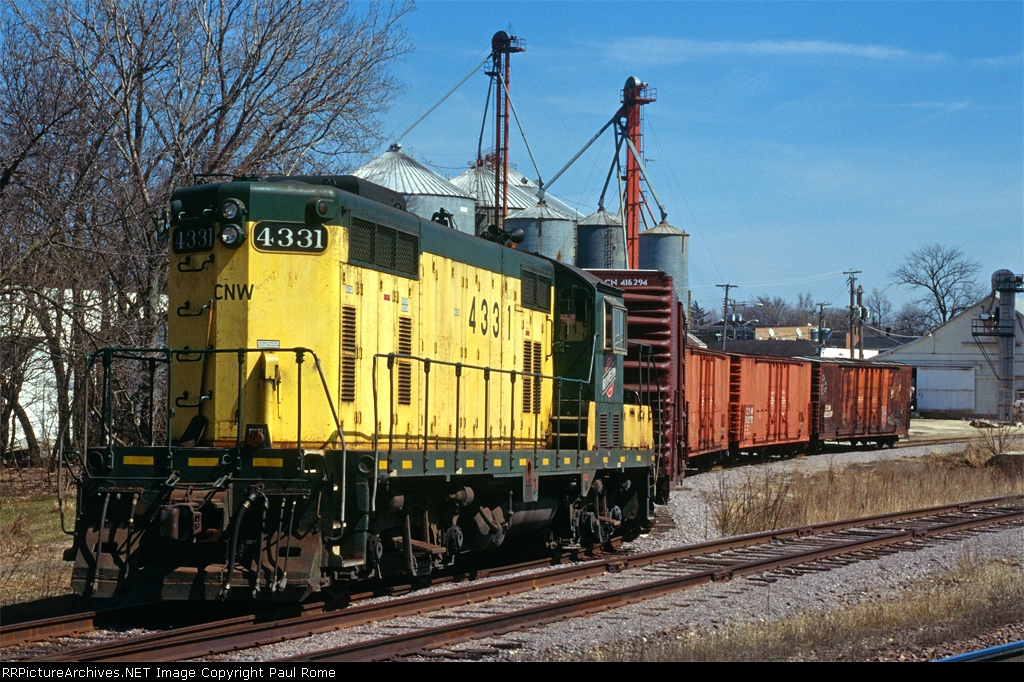 C&NW 4331, EMD GP7, switches out the Purina Feeds plant